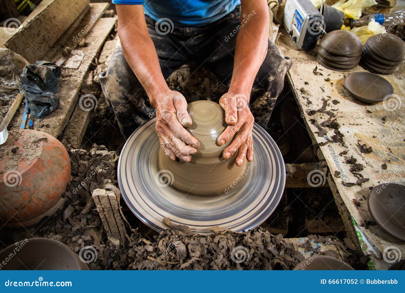 Clay Potter Creating an Earthen a Small Dish on the Circle. Editorial ...