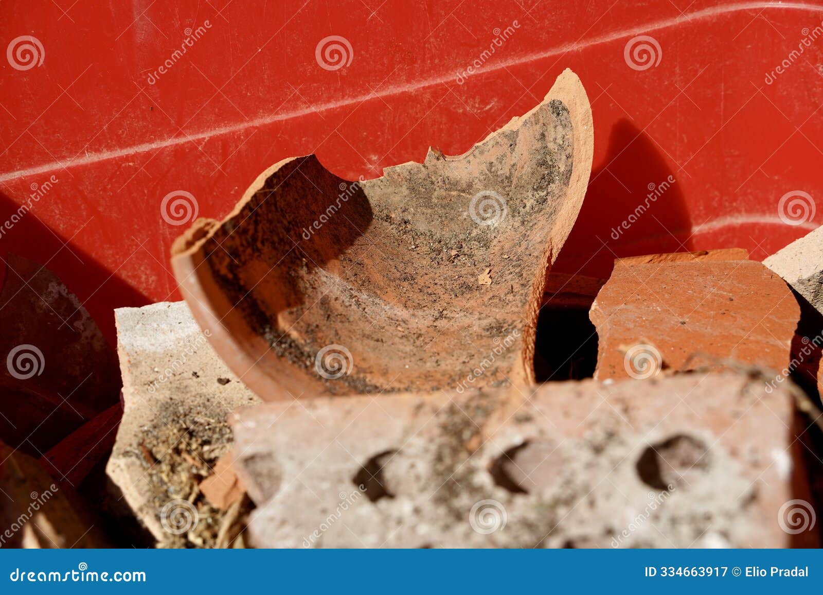 Clay Shards and Broken Vases and Bricks and Ceramic on Red Background ...