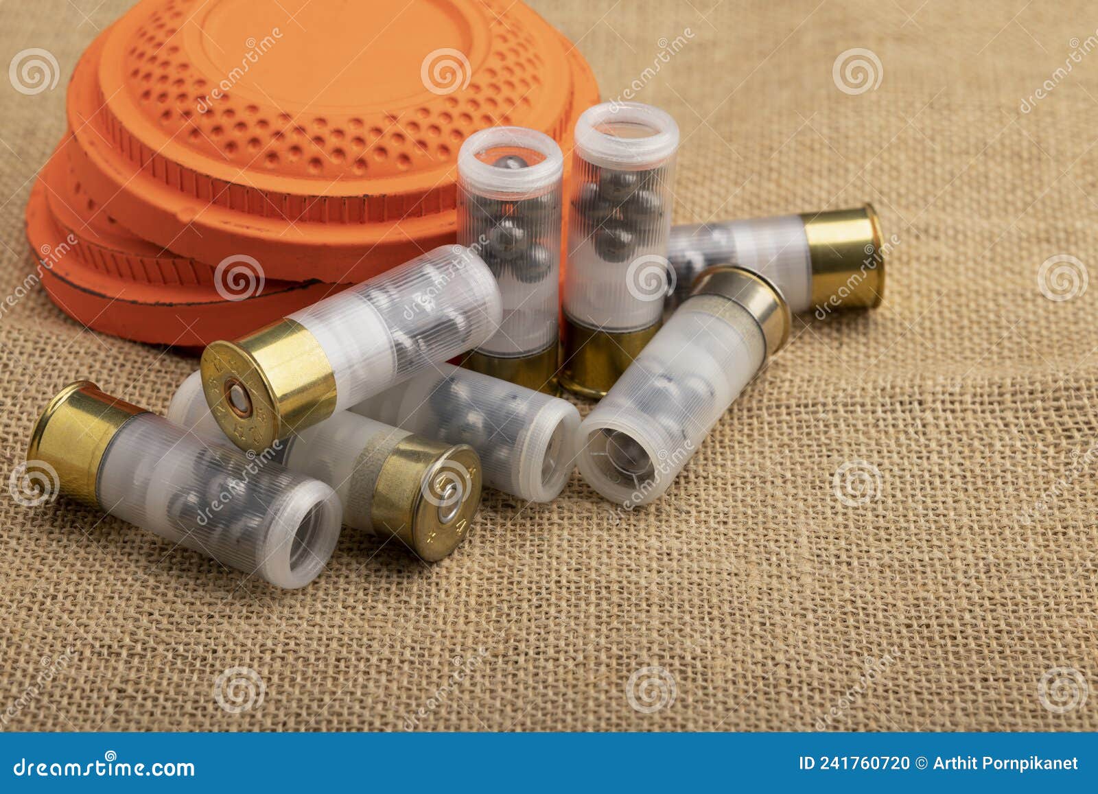 Clay Shooting Target With Shotgun Bullet On Checkered Plate Background ...