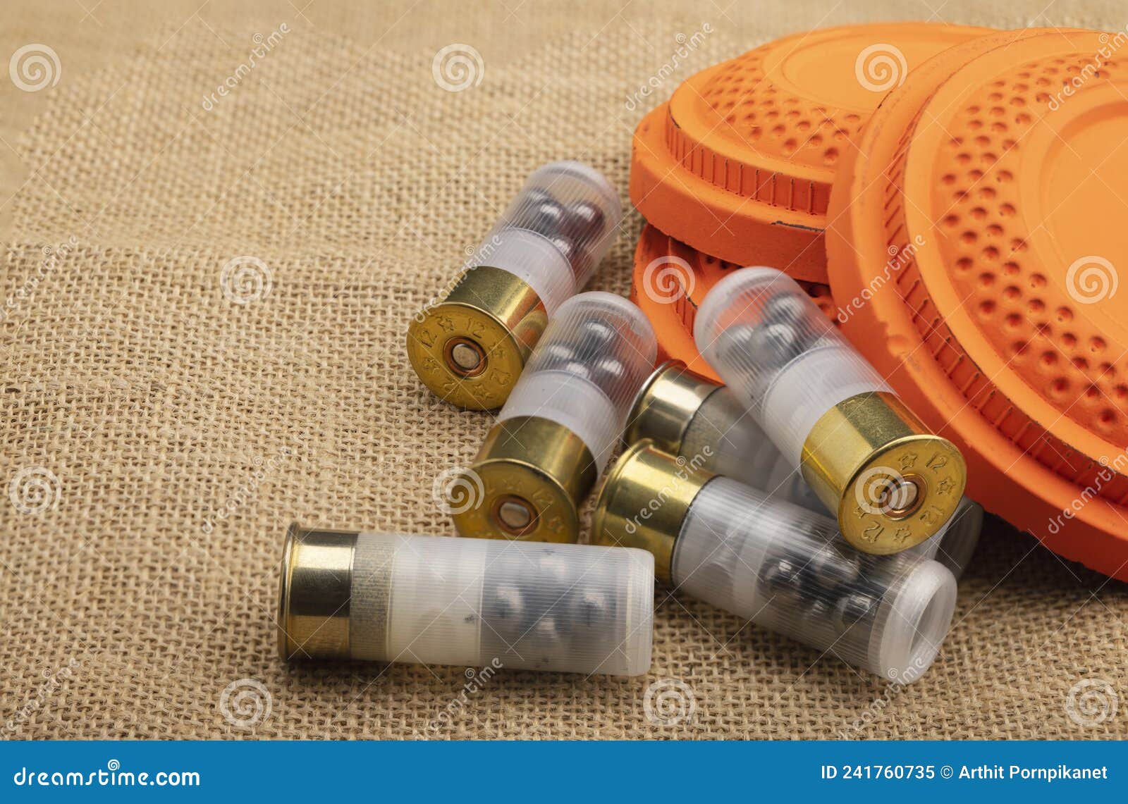 Clay Shooting Target with Shotgun Shell on Sackcloth Background , Clay ...