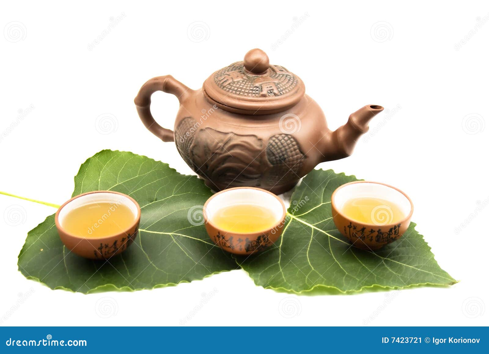 Clay Teapot and Cups with Tea Leaves Stock Image - Image of freshness ...