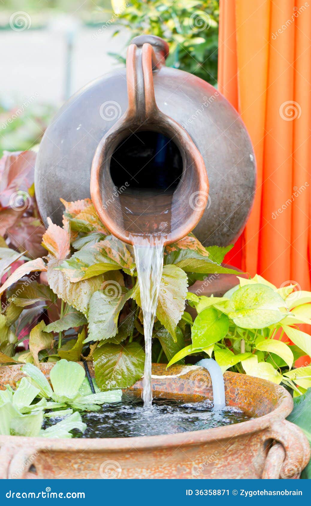 Clay Water Feature with Pond. Imagen de archivo - Imagen de adorne ...