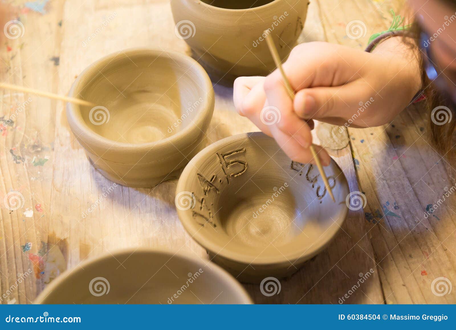 Clay works stock photo. Image of artisan, bowl, finger - 60384504