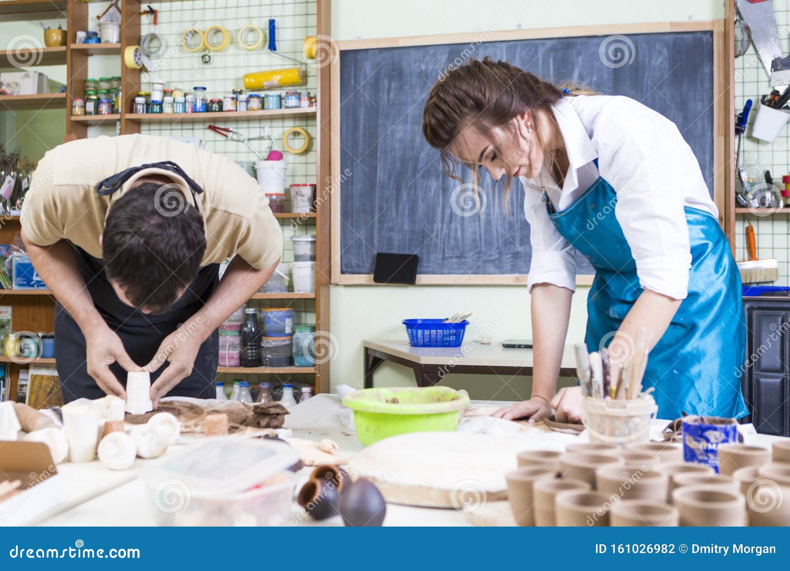 Claymaking Process Concept. Two Professional Ceramists during a Process ...