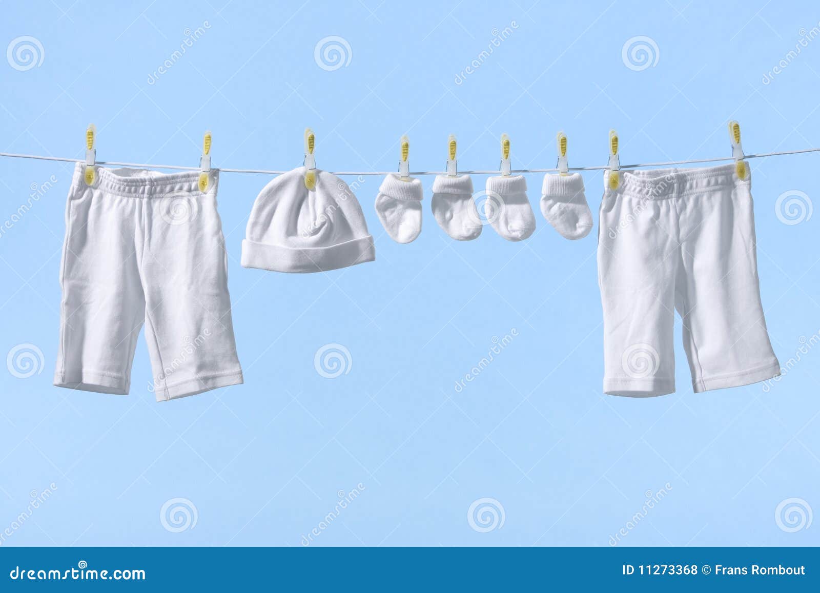 Clean Baby Laundry Hanging on a Line Stock Photo - Image of baby ...
