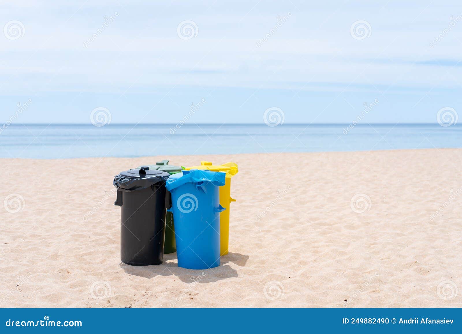 Clean beach garbage bins stock photo. Image of environment - 249882490