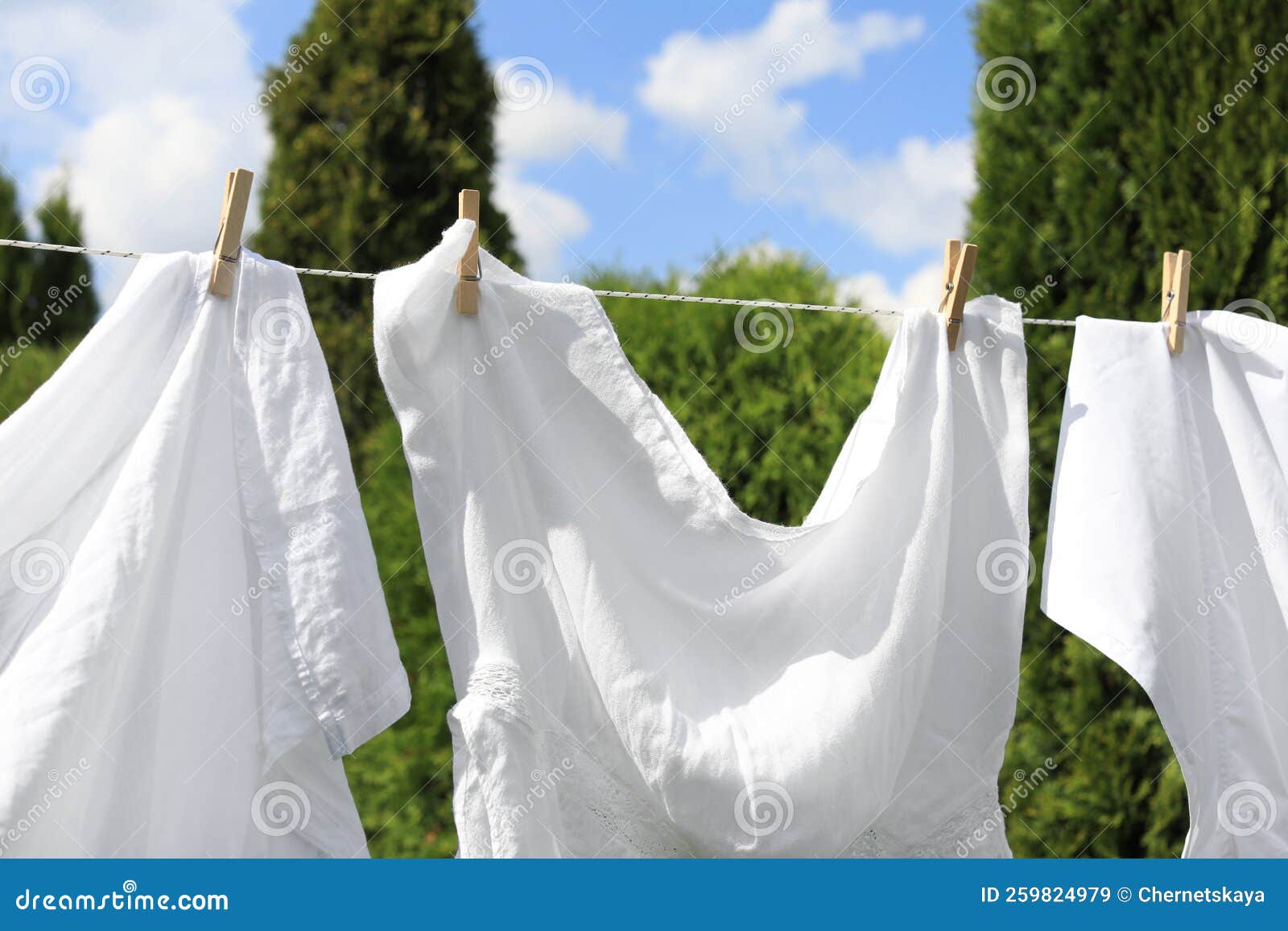 Clean Clothes Hanging on Washing Line Outdoors, Closeup. Drying Laundry ...