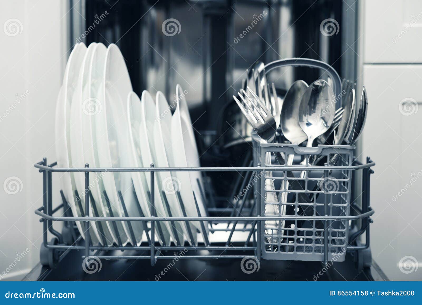 Clean cutlery and plates stock photo. Image of fork, flatware - 86554158