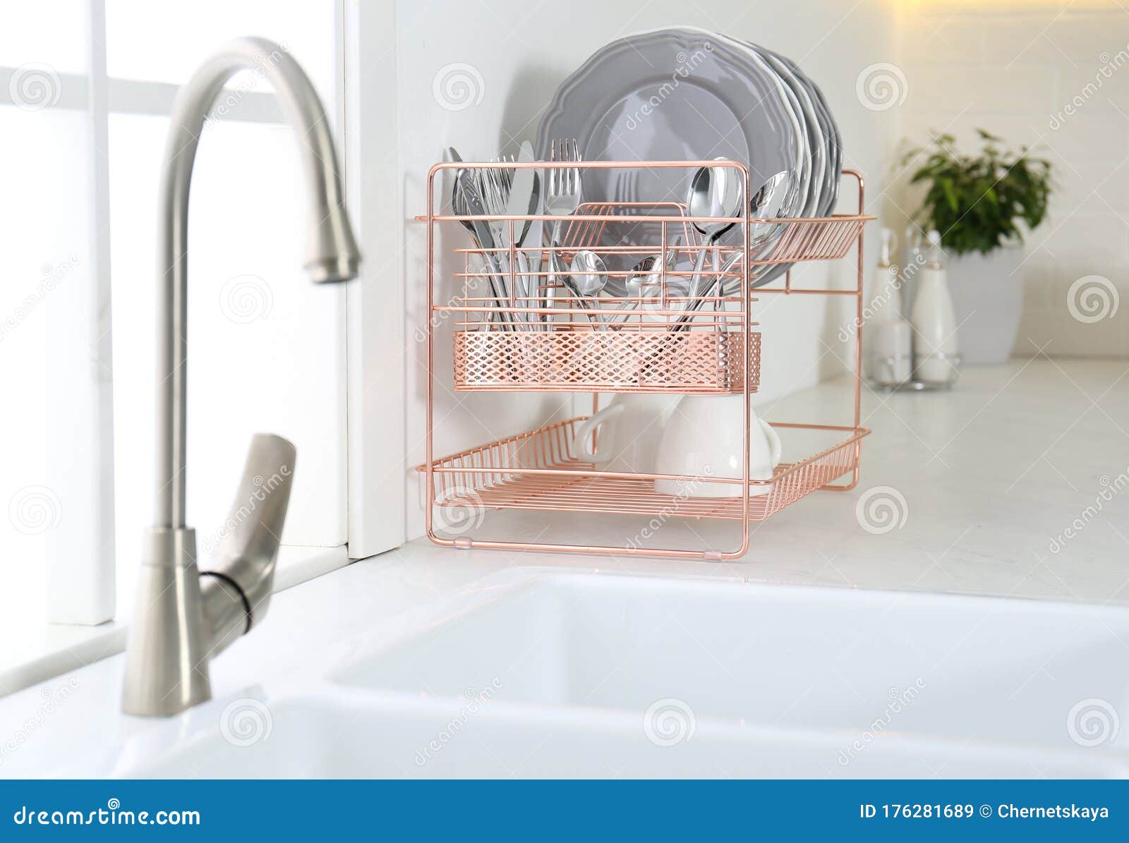Clean Dishes on Drying Rack in Modern Kitchen Stock Image - Image of ...