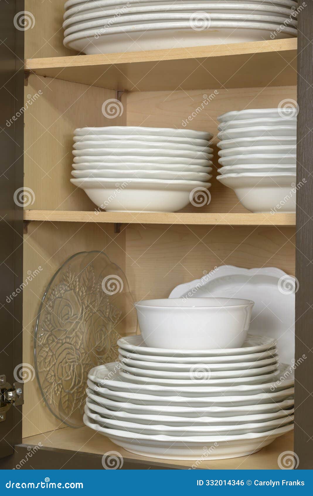Clean Dishes Stacked in Cabinet Vertical Stock Photo - Image of close ...