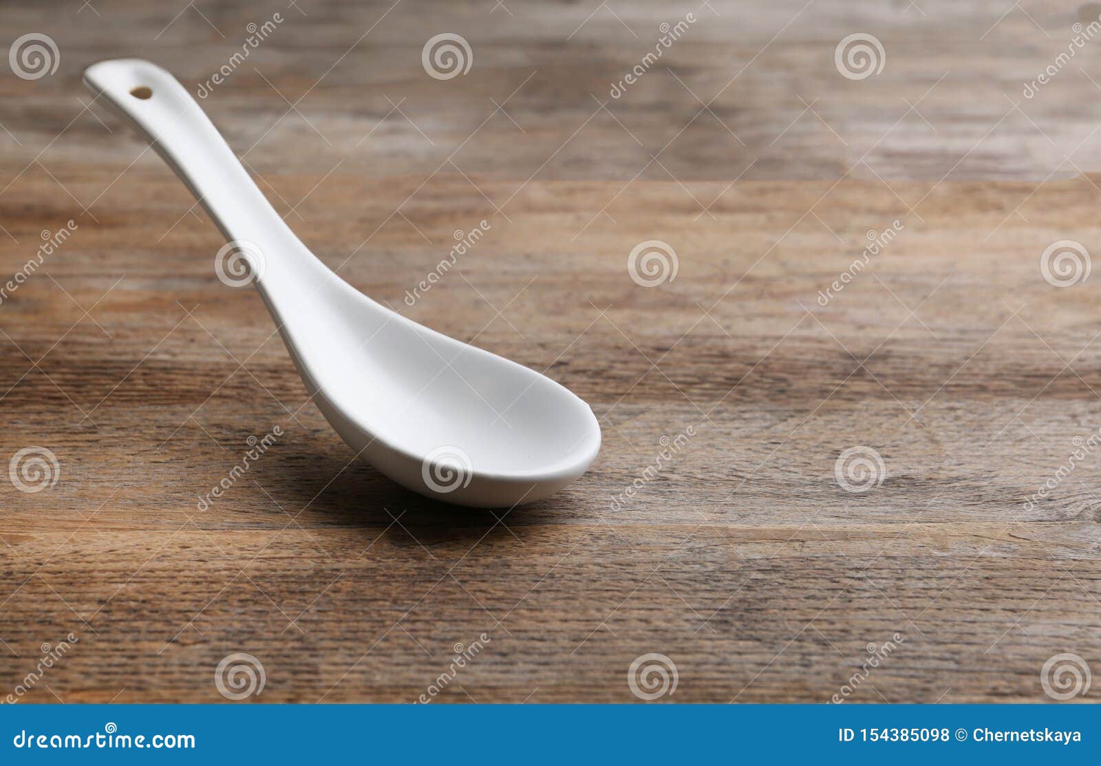 Clean Empty Miso Spoon on Wooden Background, Space for Stock Photo ...