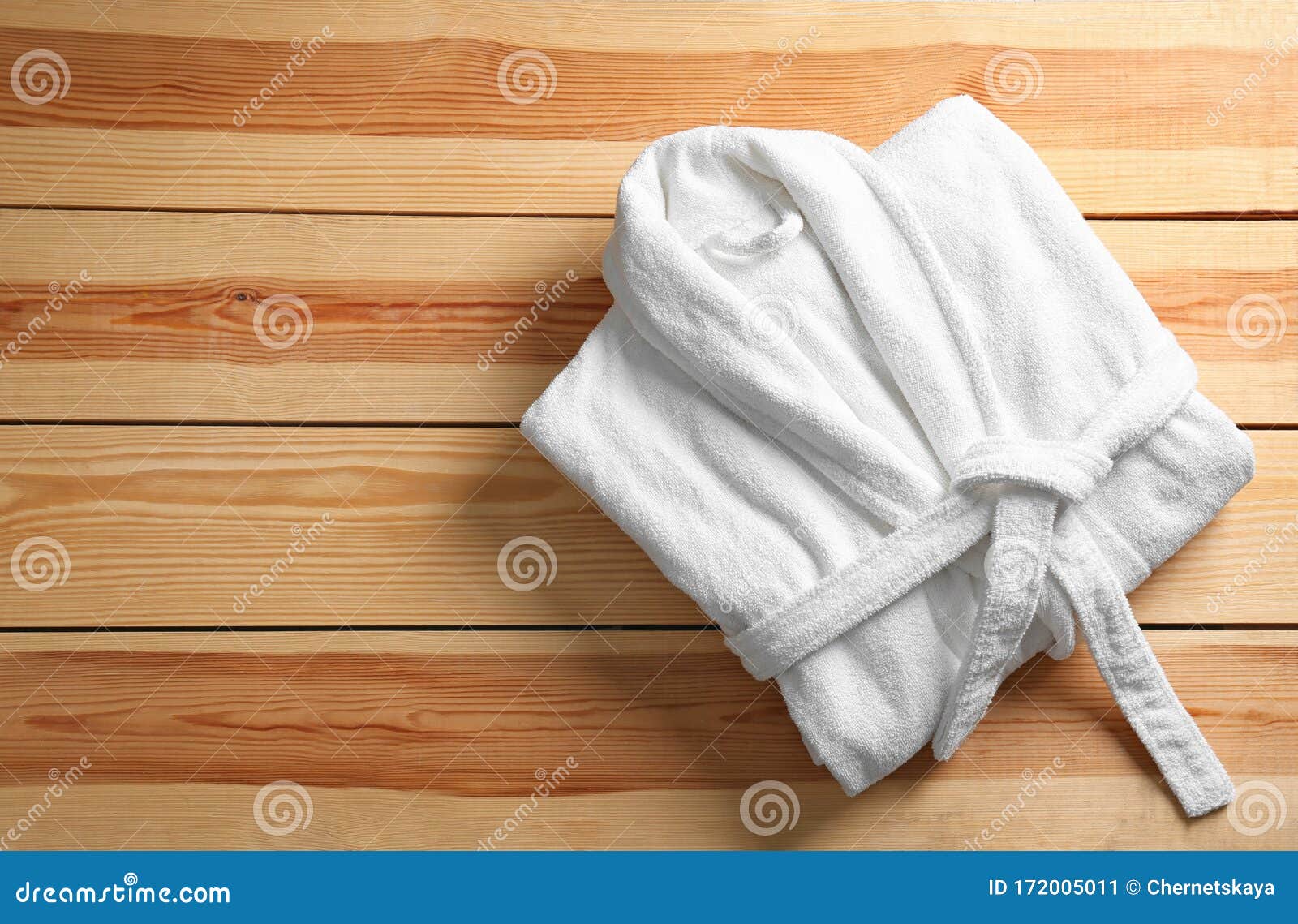 Clean Folded Bathrobe on Wood, Top View. Space for Text Stock Image ...
