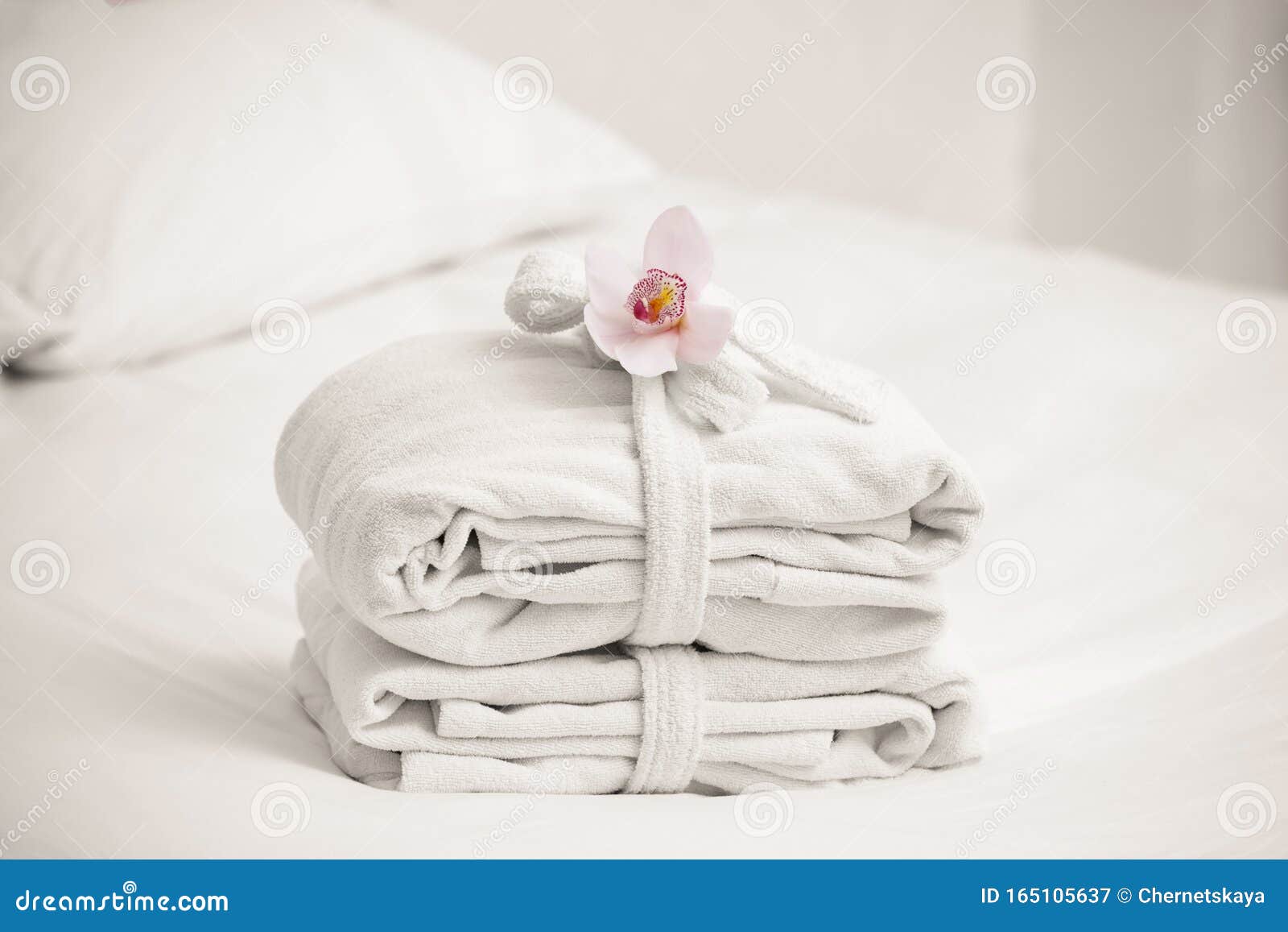Clean Folded Bathrobes on Bed Stock Image - Image of folded ...