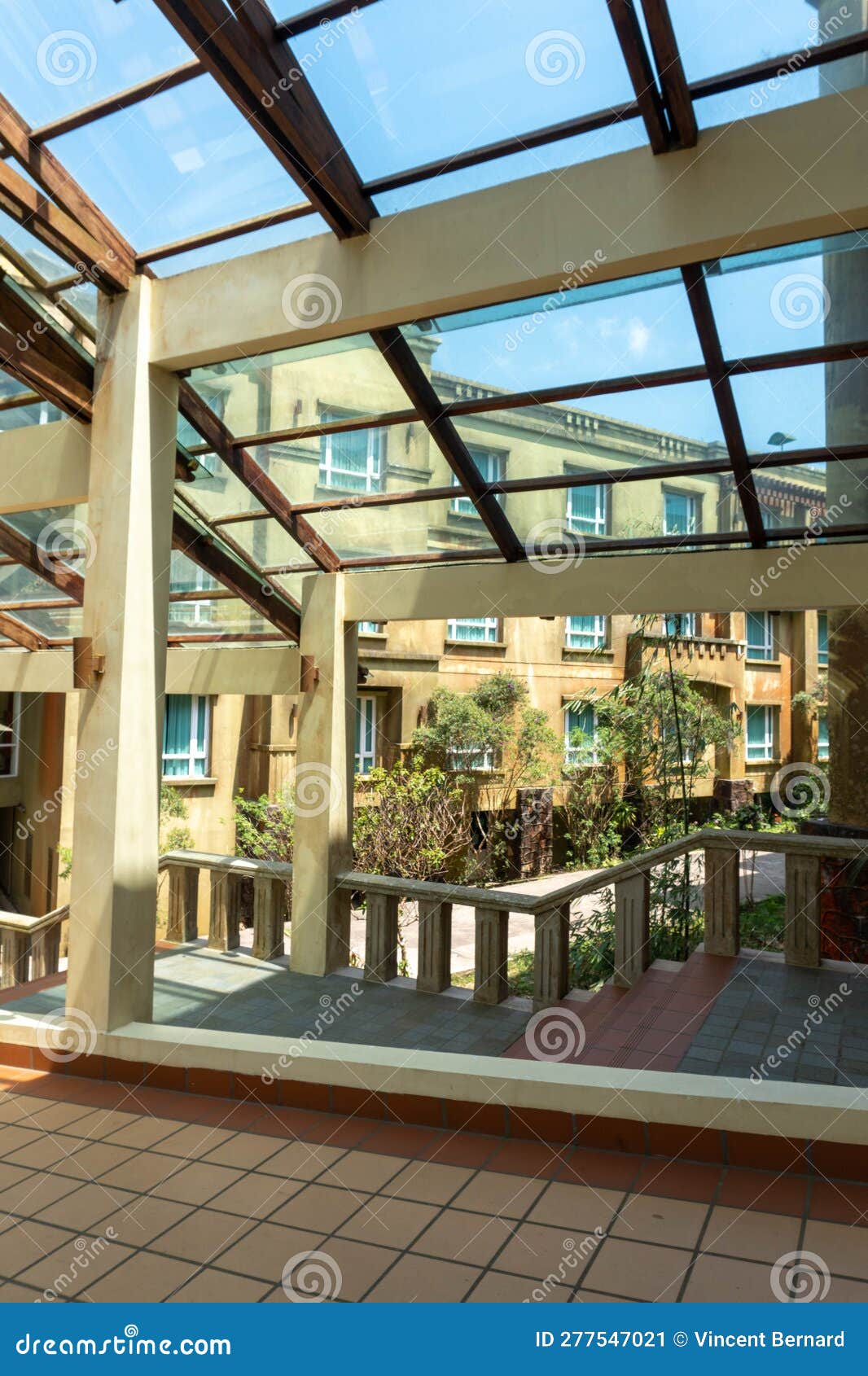 Clean Glassed Roof with a Wood Structure Over a Hallway Stock Image ...