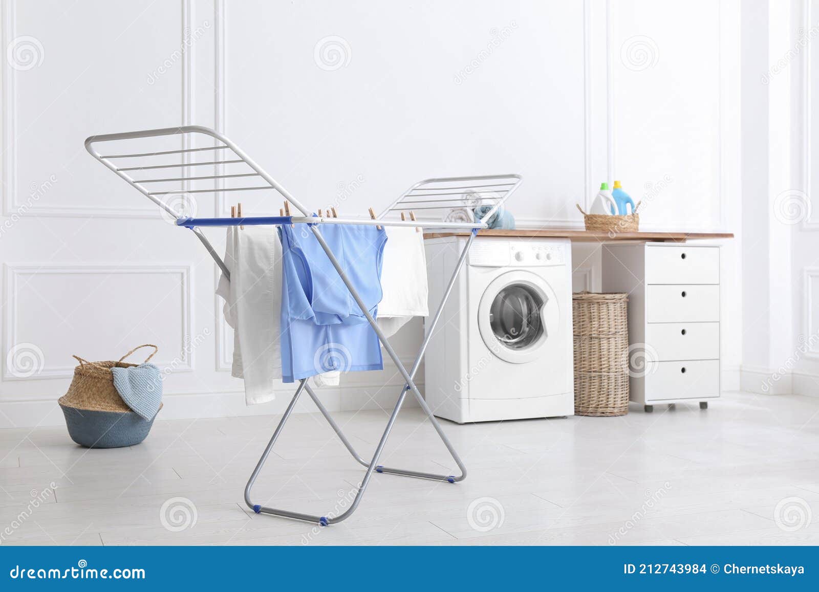Clean Laundry Hanging on Drying Rack Indoors Stock Photo - Image of ...