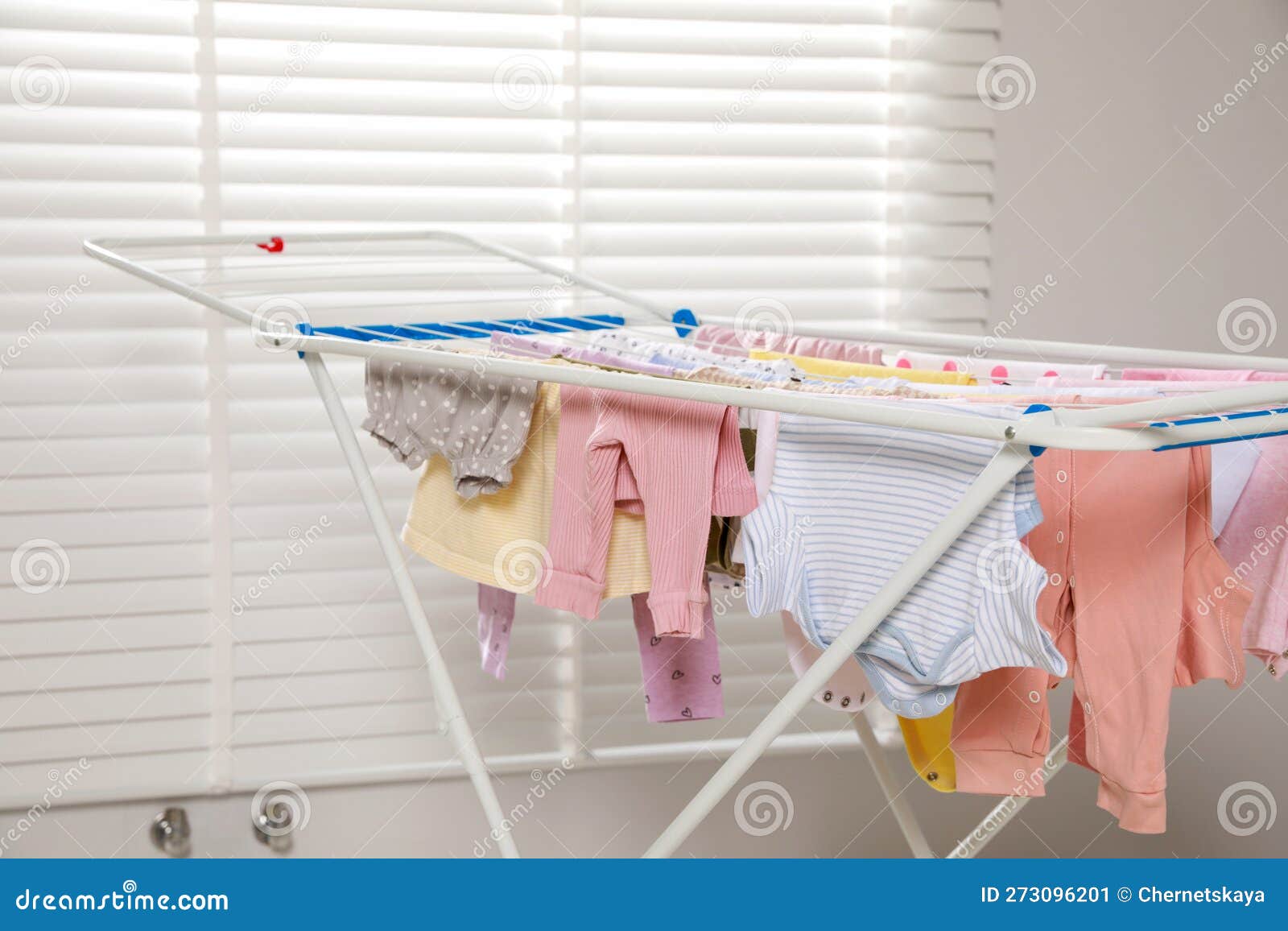 Clean Laundry Hanging on Drying Rack Indoors Stock Image - Image of ...