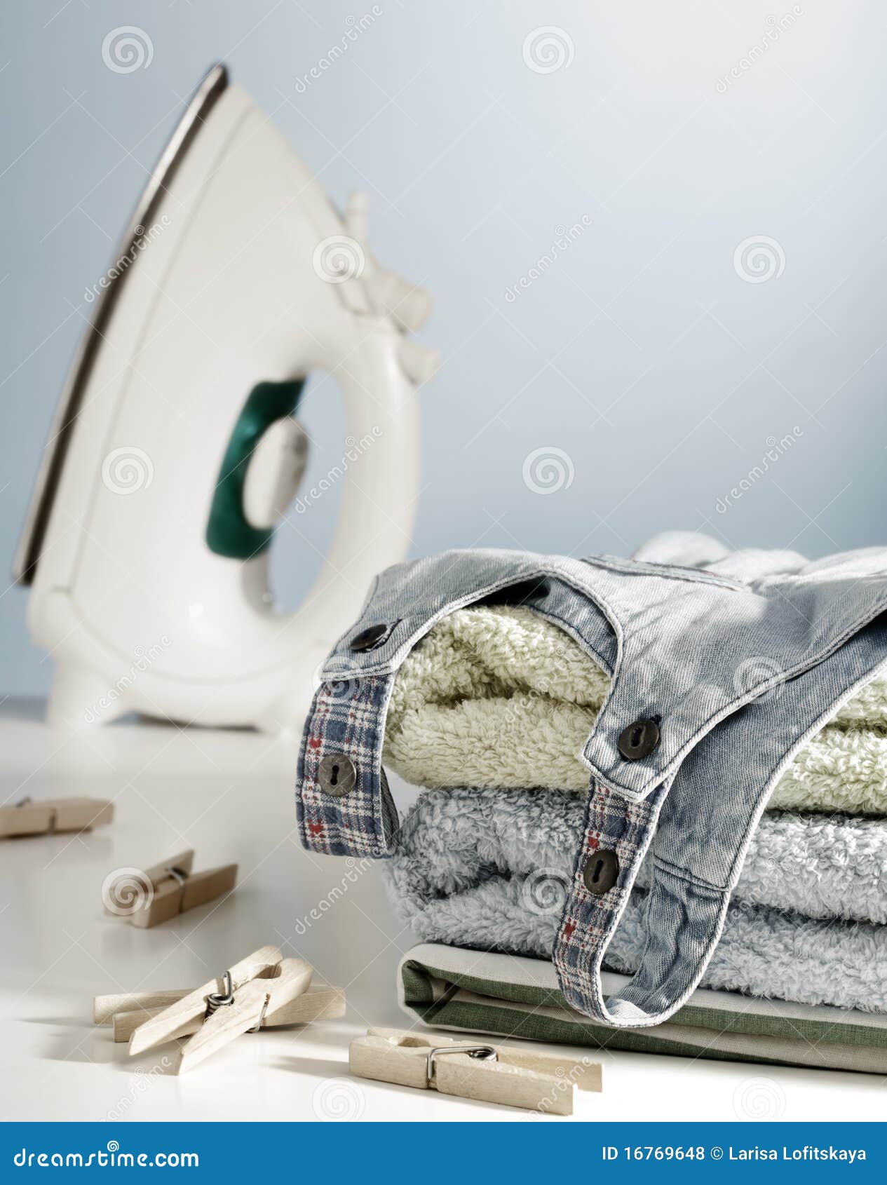 Clean laundry and iron stock photo. Image of ironing - 16769648