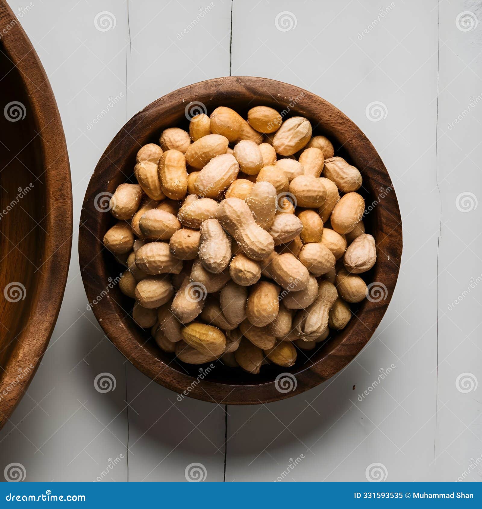 Raw Salted Peanut In Bowl And Sweet Peanut Butter Spreaded On Bread ...
