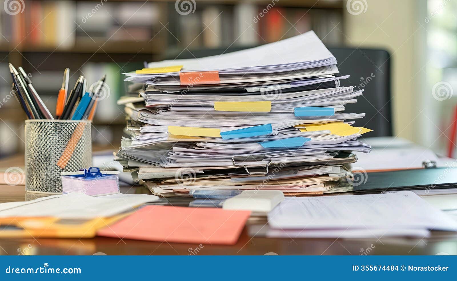 A Clean Office Desk with a Stack of Organized Documents and Supplies ...