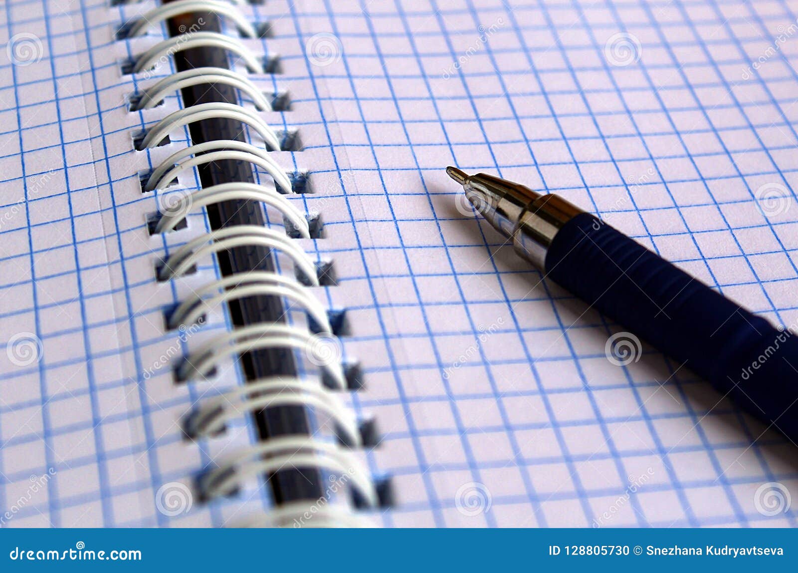 Clean Open Checked Notebook with Blue Pen Stock Photo - Image of metal ...