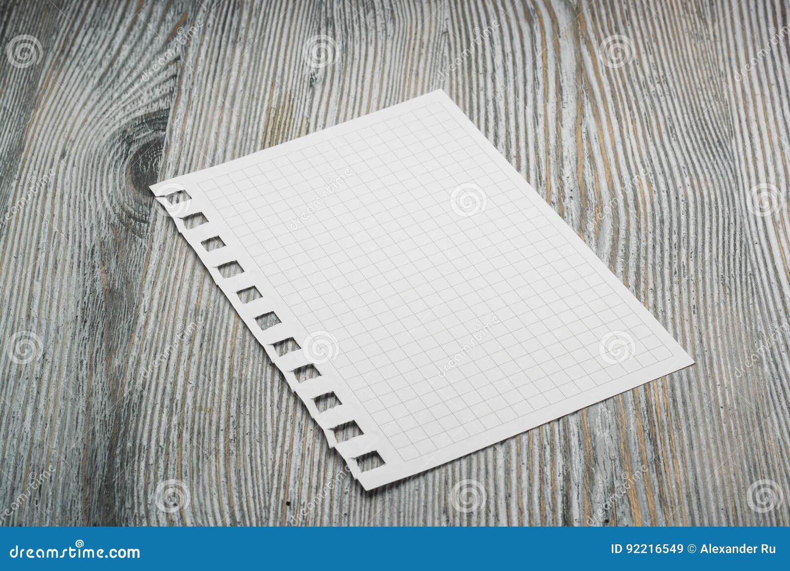 Clean Sheet in Cell from Notebook on Rustic Table. Stock Image - Image ...