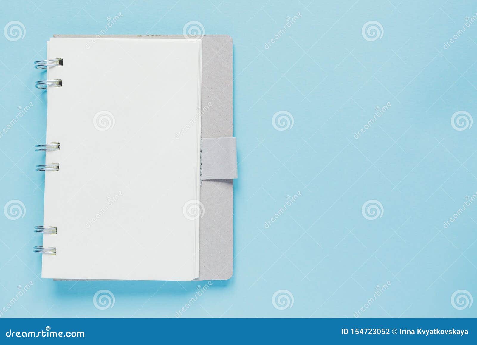 Clean Spiral Note Book for Notes and Messages on Blue Background ...