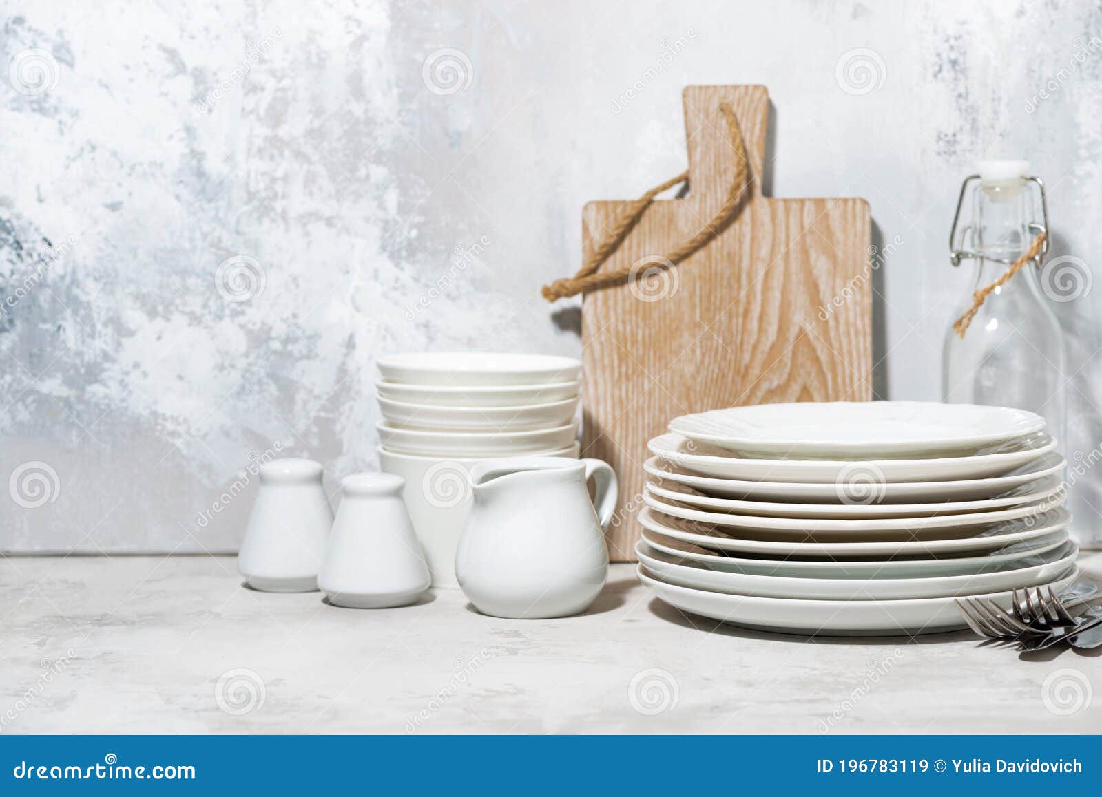 Clean Tableware, Cutlery and Kitchen Utensils on White Table Stock ...