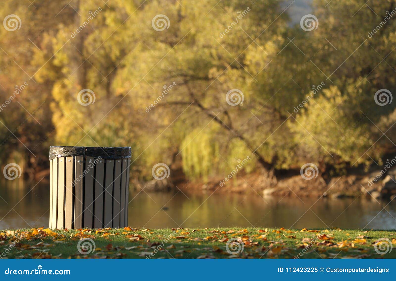 An Environmentally Friendly Trash Can at the Park. Stock Image - Image ...