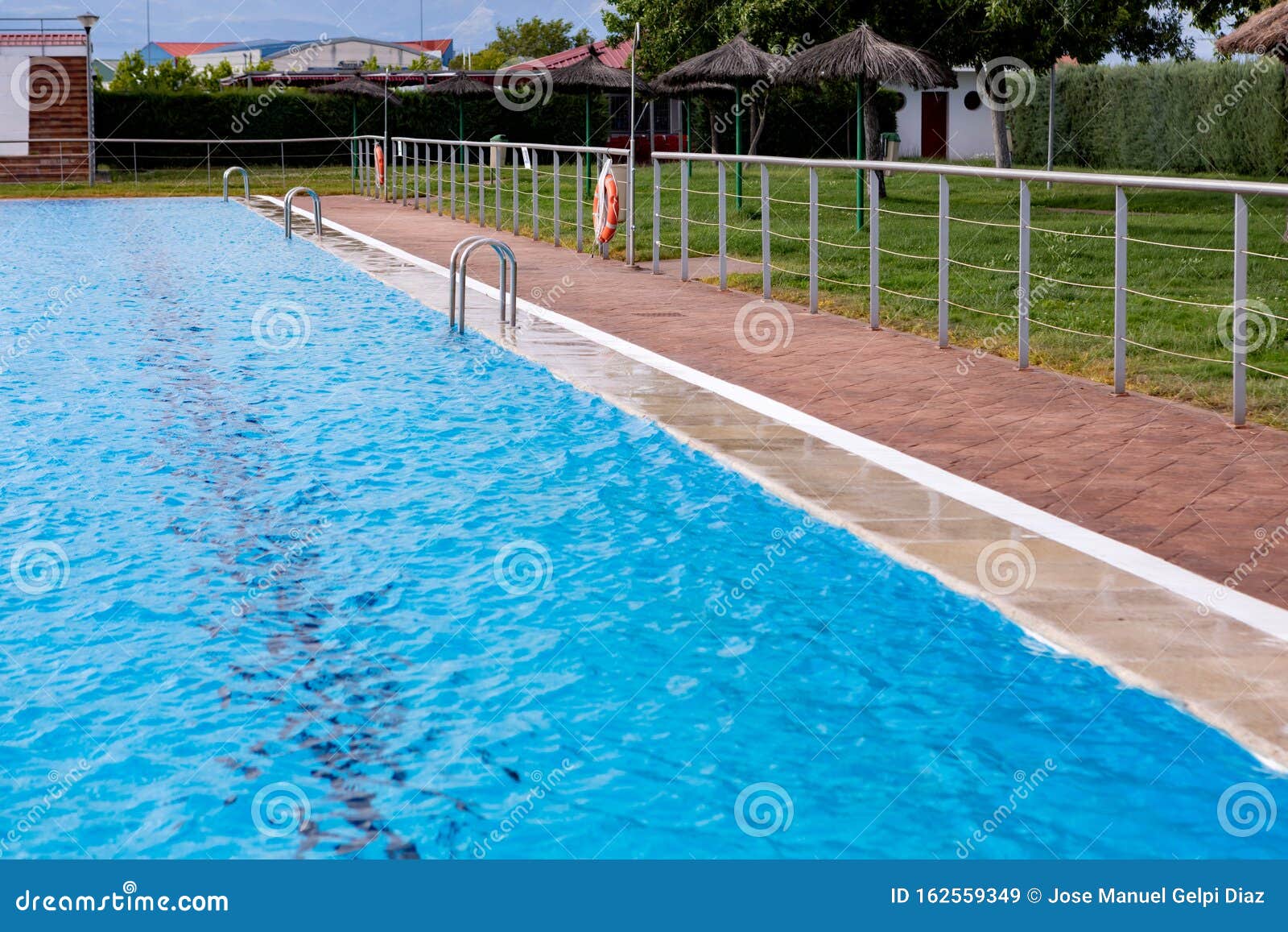 Clean water in a blue pool stock image. Image of chlorine - 162559349
