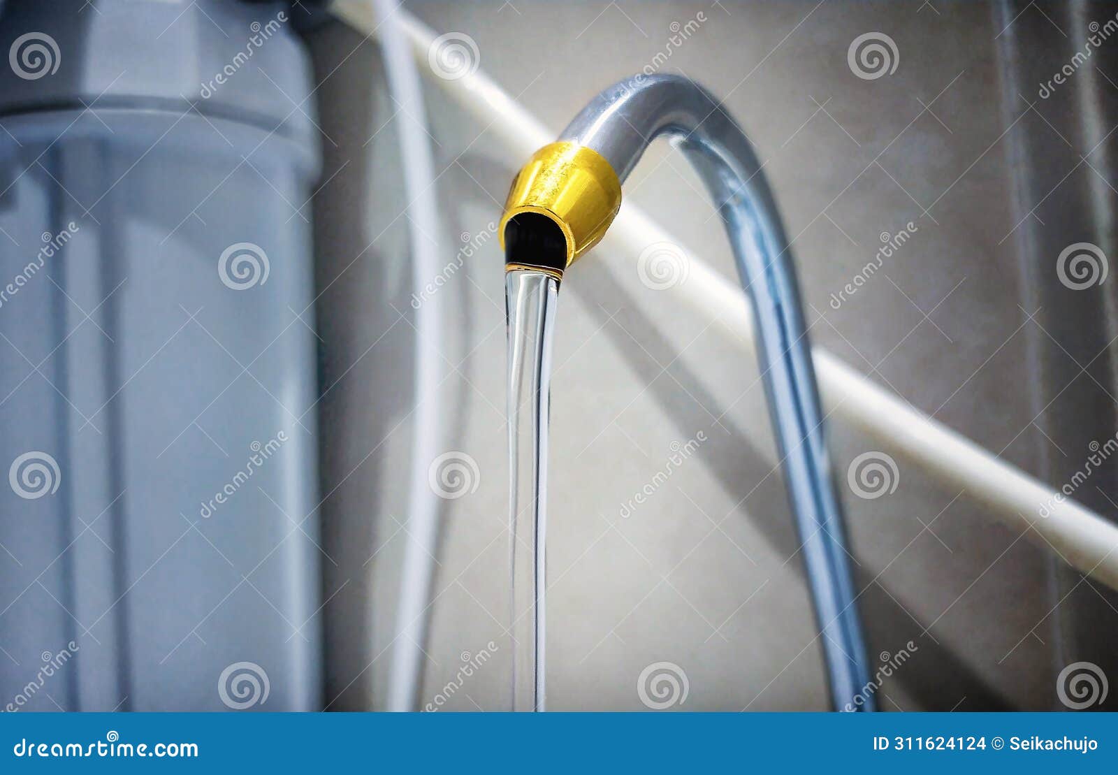 Clean Water Flows from a Filtration Tap, Ensuring Purity and Safety ...