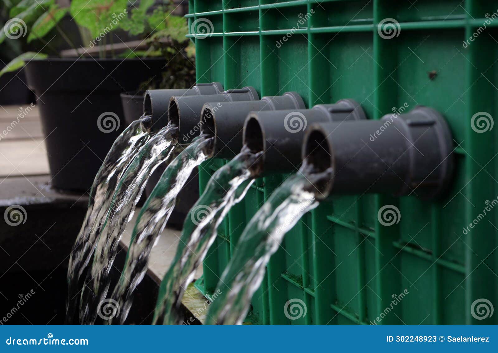 Clean Water Flows in a Pipe after Being Filtered in a Fish Pond Stock ...