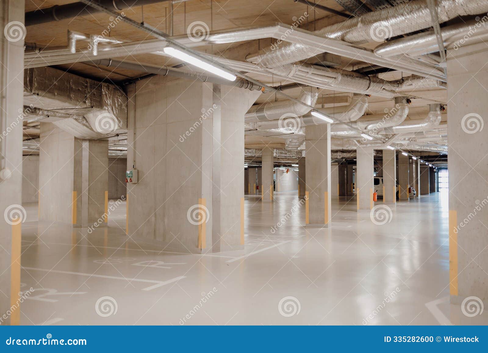 Clean, Well-lit Underground Parking Garage with Concrete Pillars Stock Photo - Image of empty ...