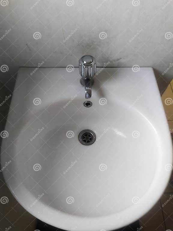 Clean White Wastafel on the Wall, Top and Front View. Stock Photo ...