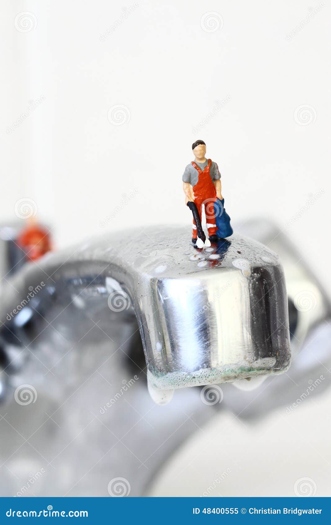 Cleaner cleaning tap B stock image. Image of industry - 48400555