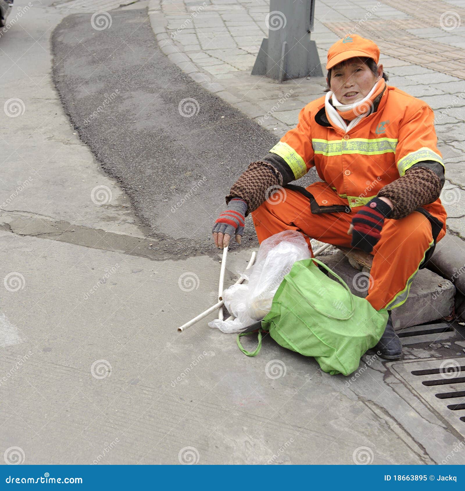 A Cleaner Sitting on the Roadside To Rest Editorial Image - Image of ...