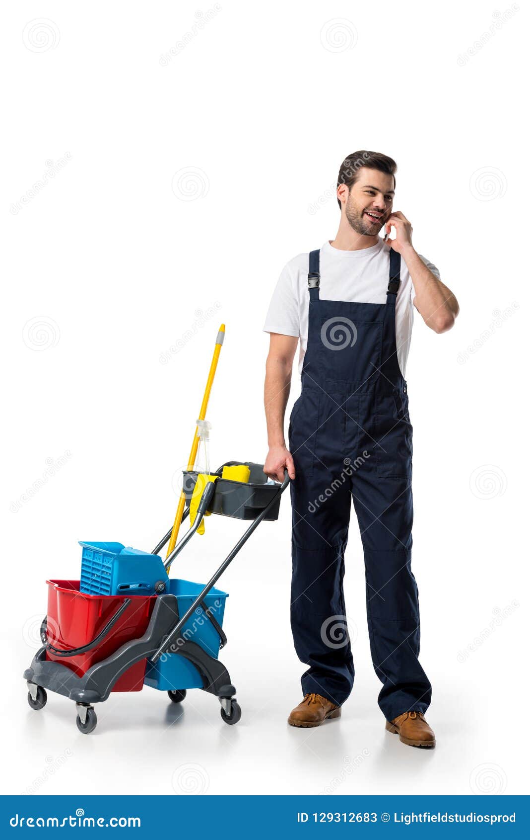 Cleaner in Uniform with Cart Talking on Smartphone Stock Image - Image ...