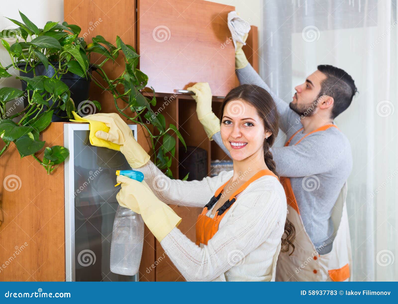Cleaners cleaning in room stock image. Image of houseman - 58937783