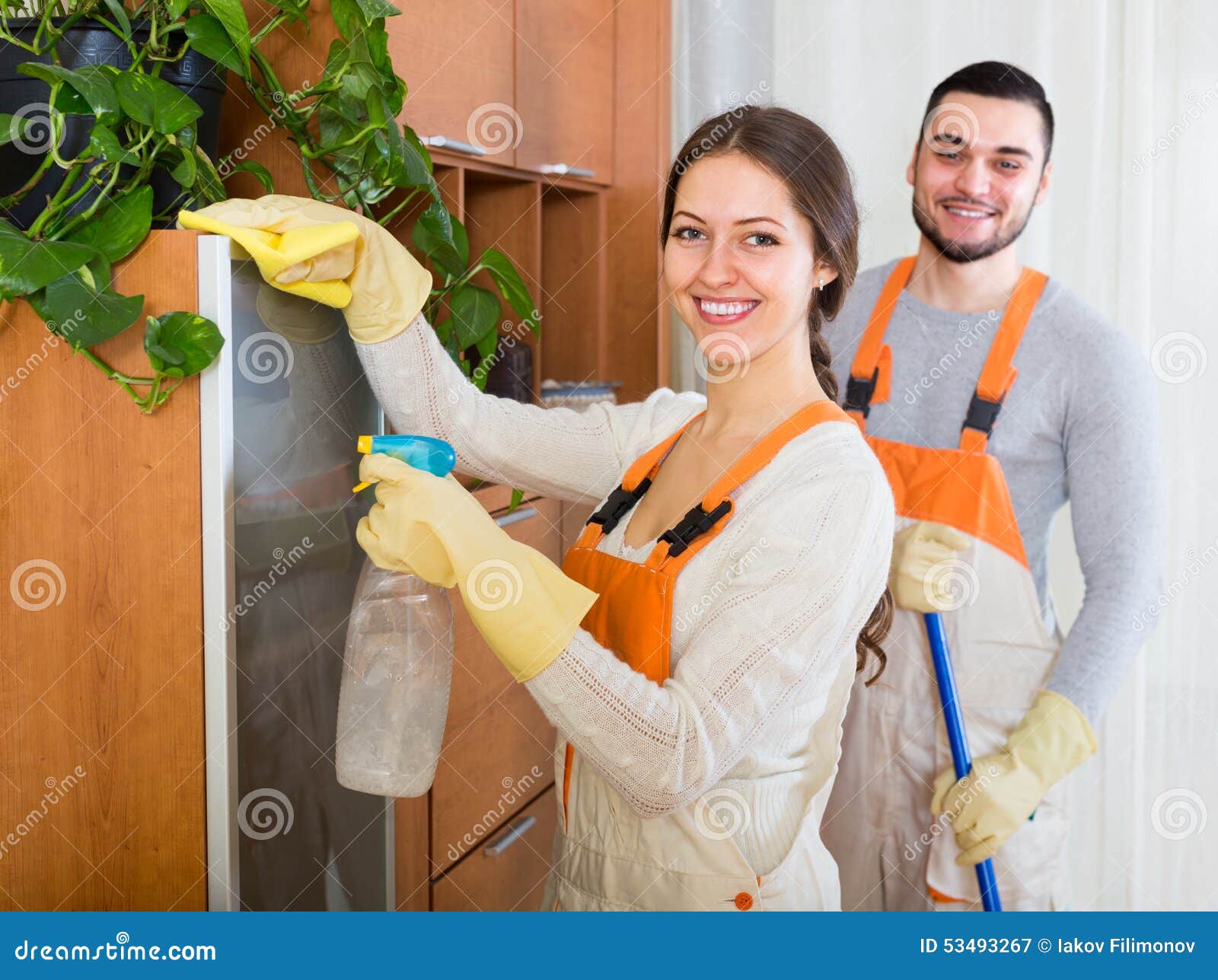 Cleaners cleaning in room stock image. Image of female - 53493267