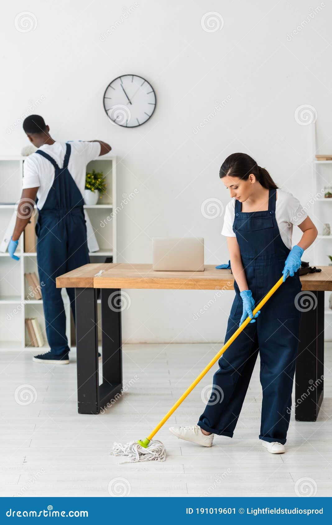 Cleaners in Uniform and Rubber Gloves Cleaning Office Stock Image ...