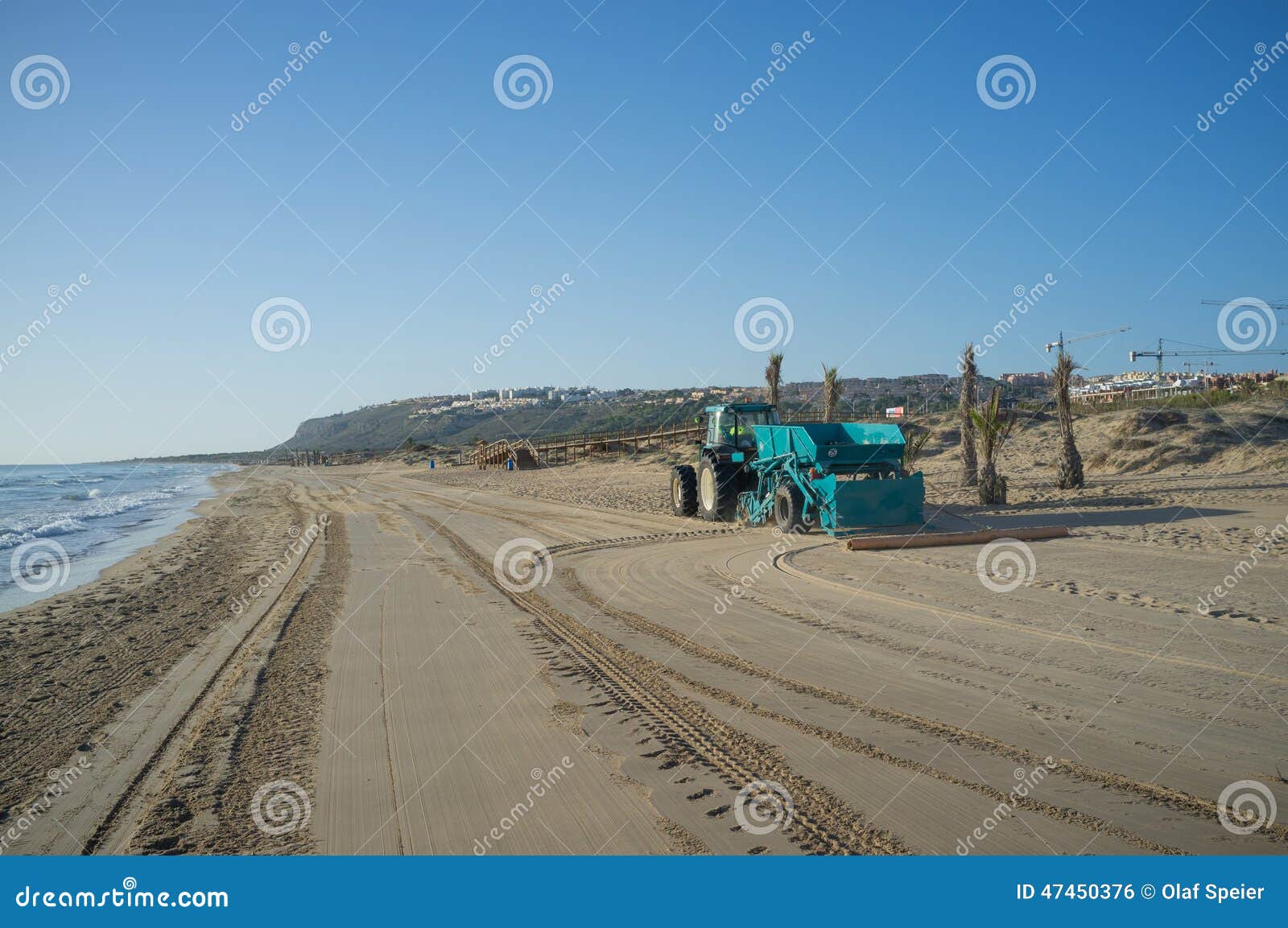 Cleaning the beach stock photo. Image of shore, spain - 47450376