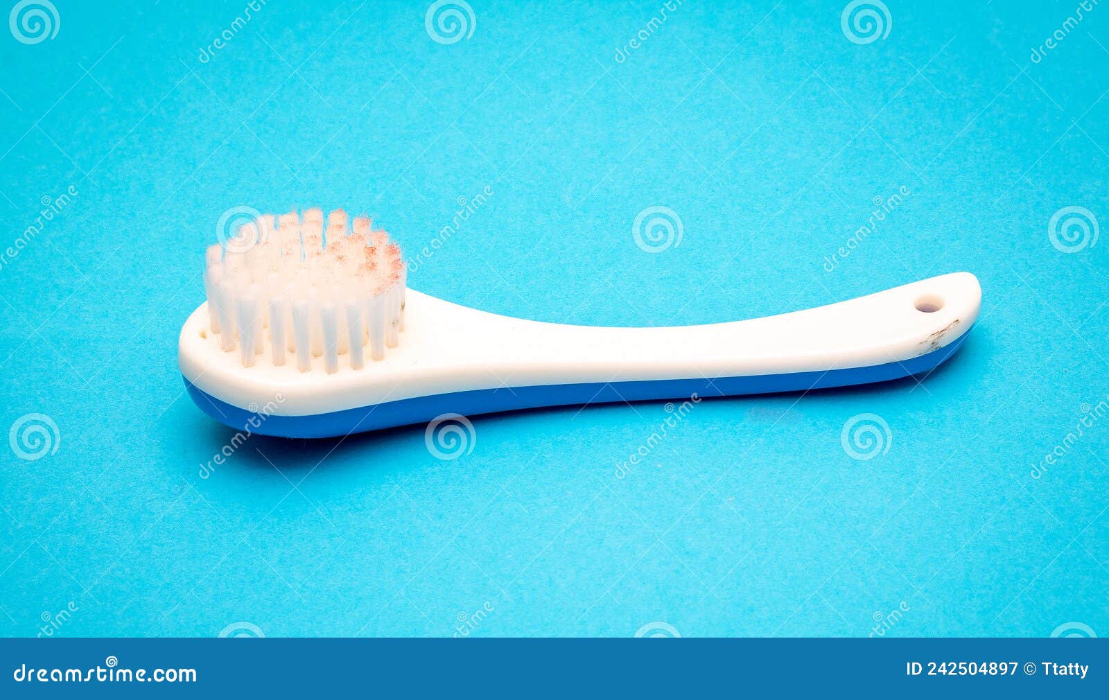 Cleaning brush on blue stock image. Image of exfoliating - 242504897