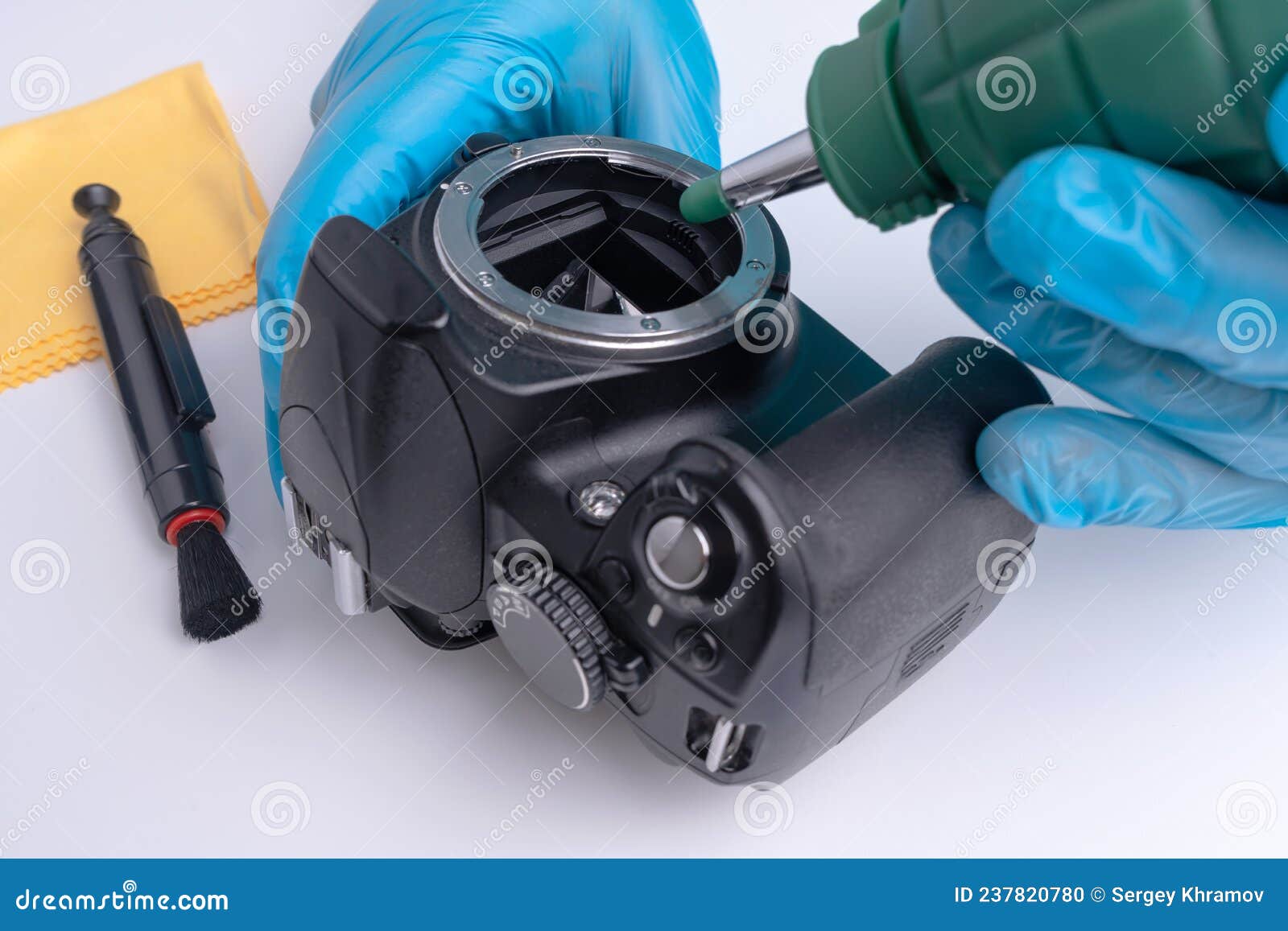 Cleaning the Camera Matrix, Blowing Off the Sensor with a Blower Stock ...