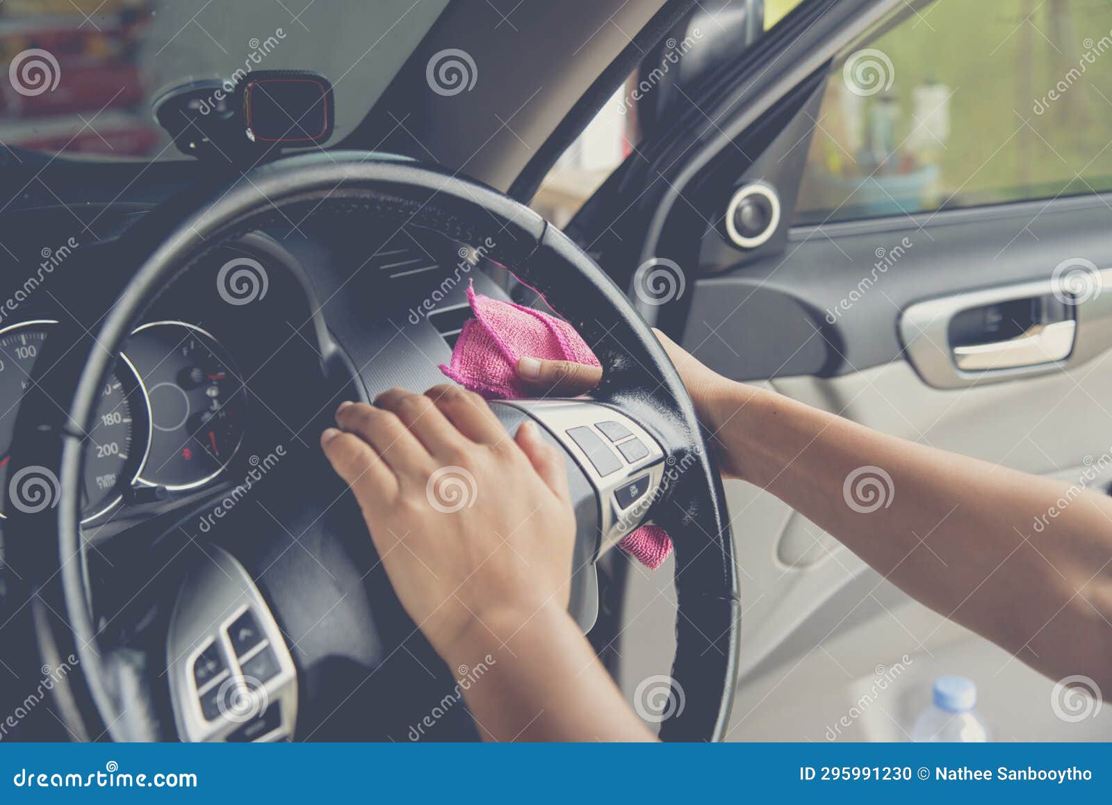 Cleaning Car Light Switch Control from the Dust . Stock Photo - Image ...