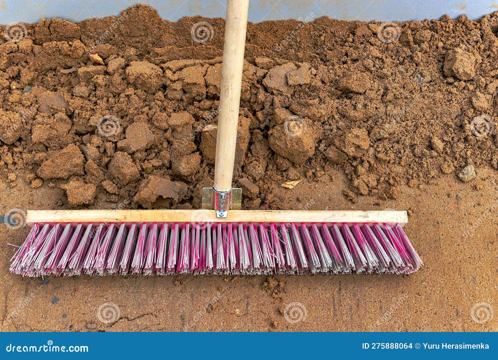 Cleaning a Construction Site with a Brush and Showel Stock Photo ...