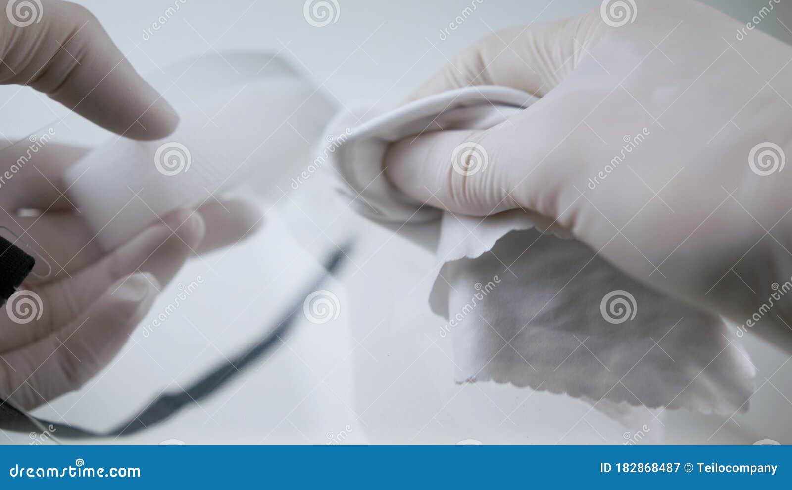 Cleaning a Coronavirus Face Shield in a White Sterile Environment Stock ...