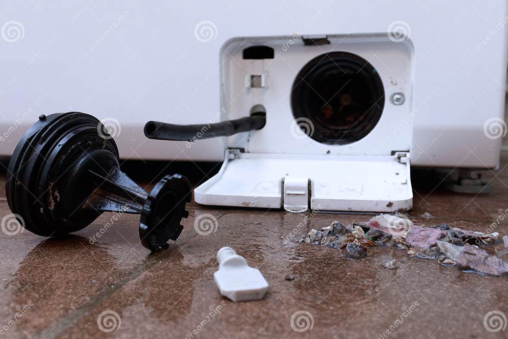 Cleaning the Debris Filter in Washing Machine Stock Photo - Image of ...