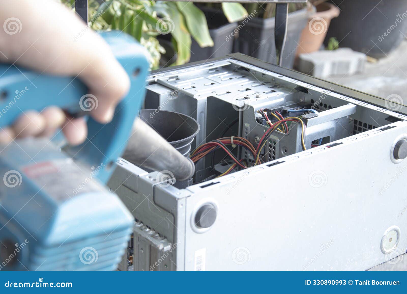 Cleaning a Dusty Computer with a Blower Stock Image - Image of damage, hand: 330890993