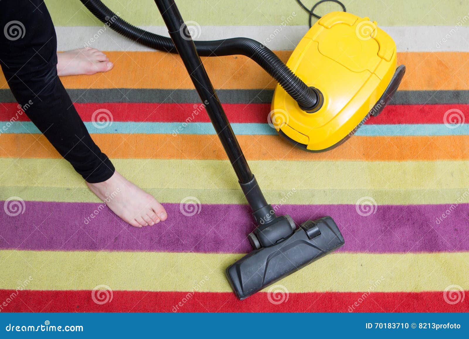 Cleaning floor with hoover stock photo. Image of girl - 70183710