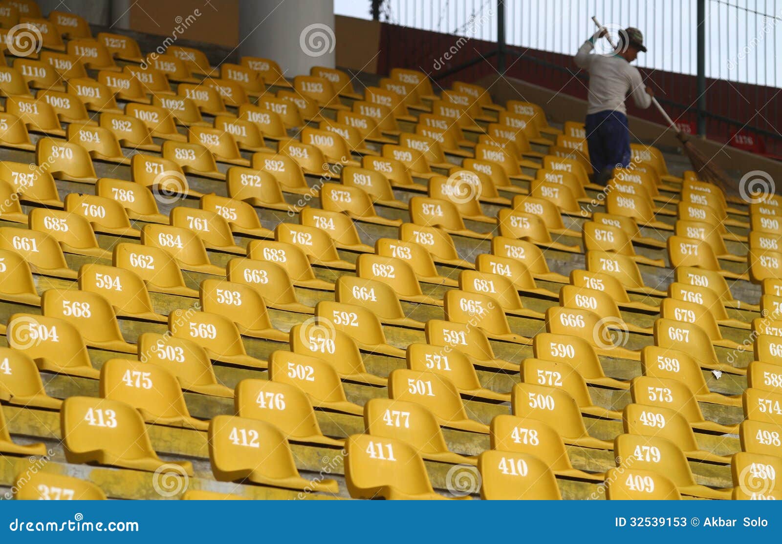 Cleaning football stadium editorial stock photo. Image of java - 32539153