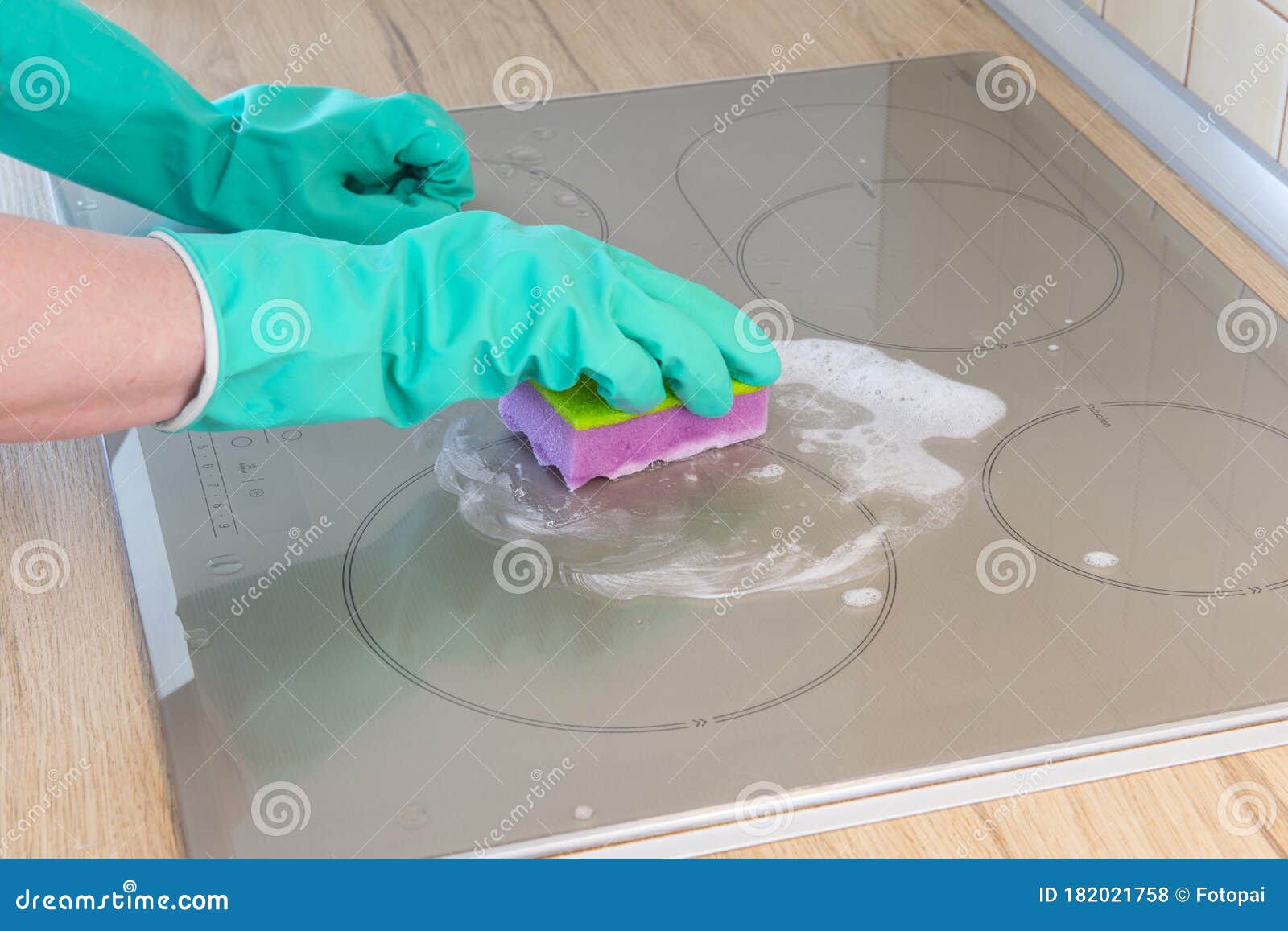 Cleaning the Induction Cooker Stock Photo - Image of rubber, beige ...